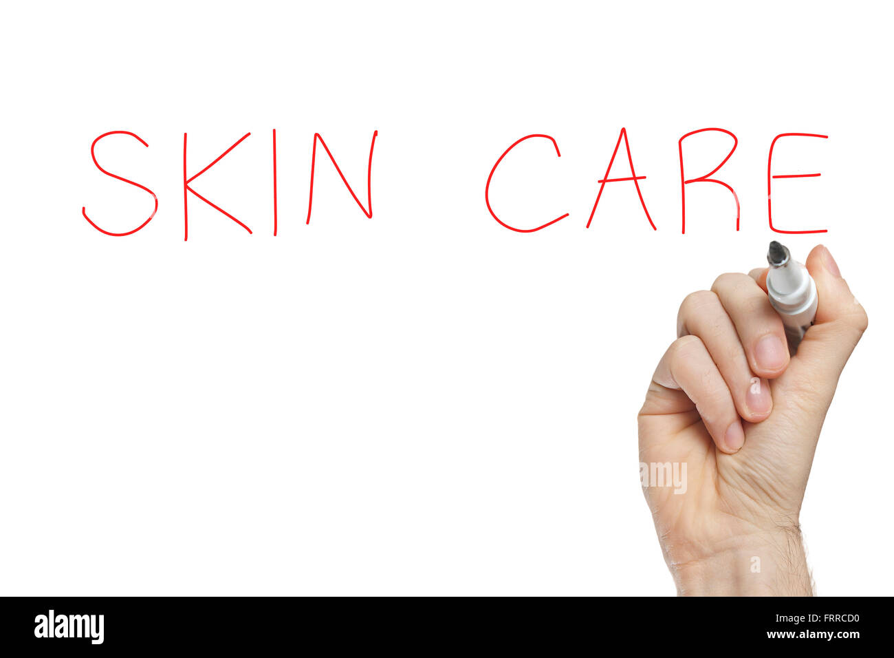 Hand writing skin care on a white board Stock Photo - Alamy