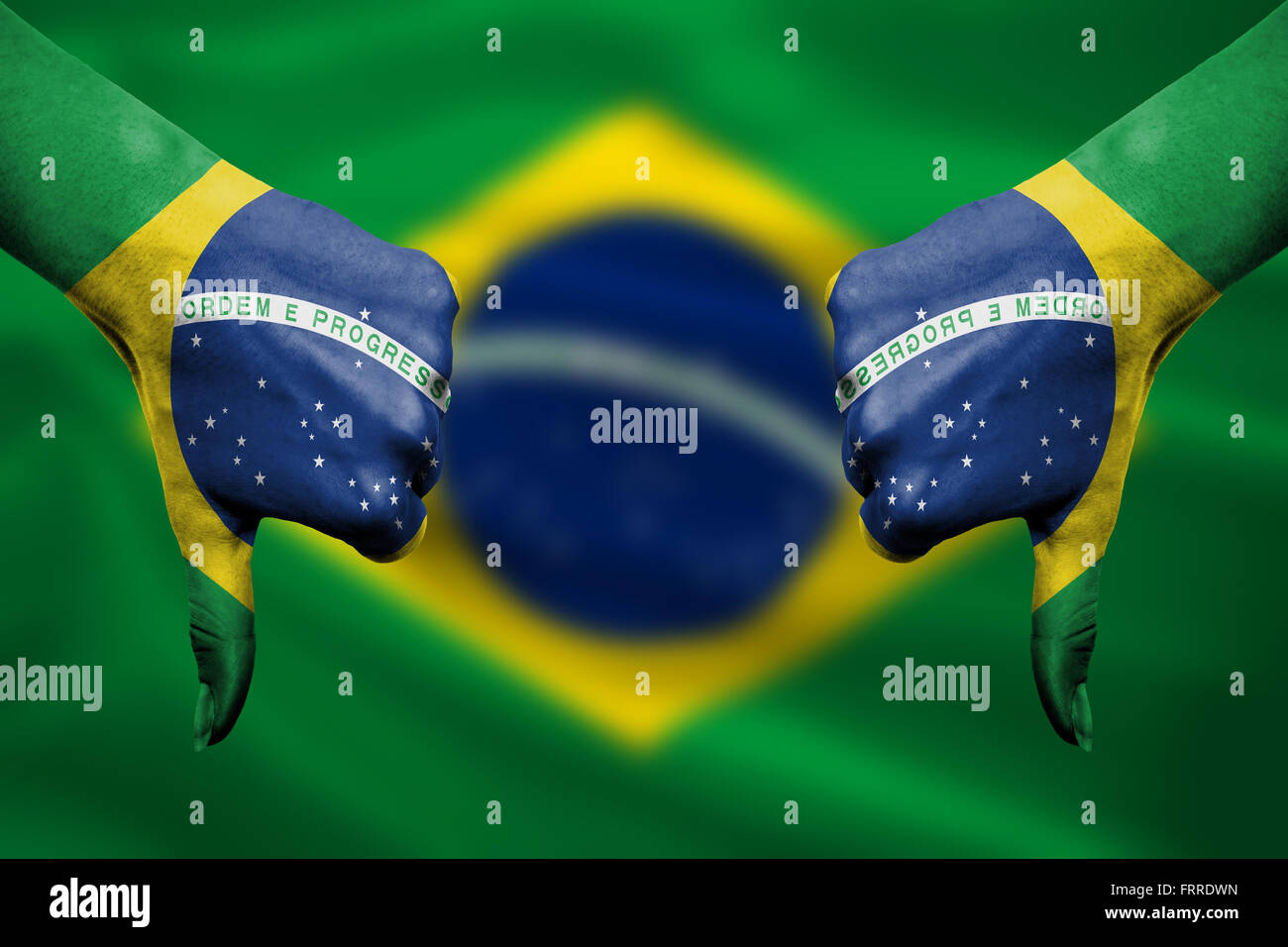 failure of Brazil - hands gesturing thumbs down in front of flag Stock ...