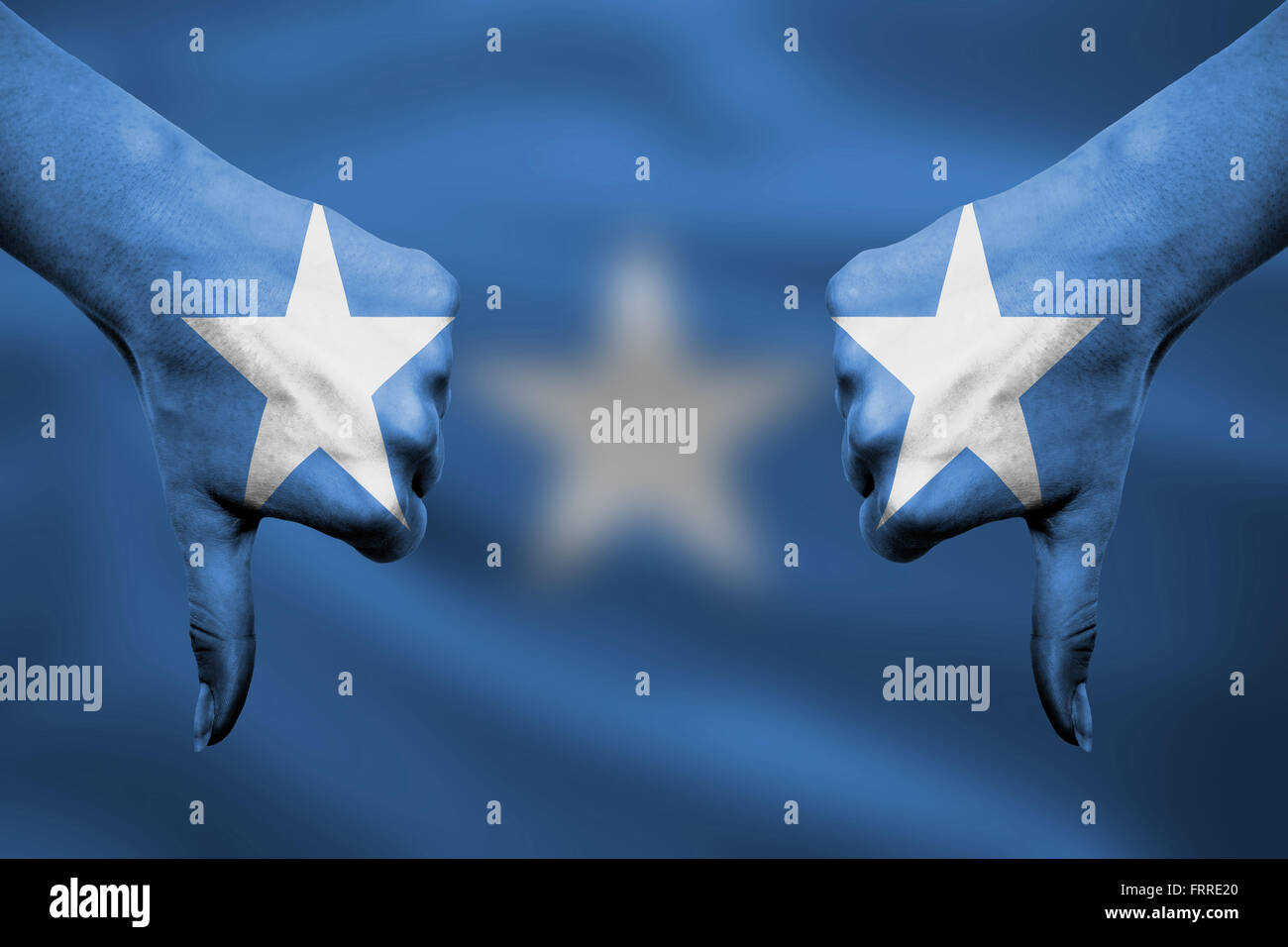 failure of Somalia - hands gesturing thumbs down in front of flag Stock ...