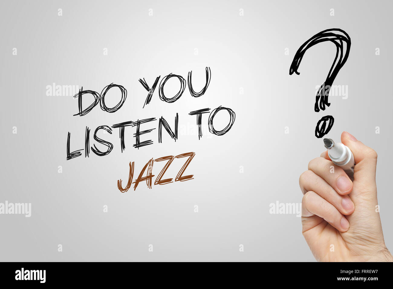 Hand writing do you listen to jazz on grey background Stock Photo - Alamy