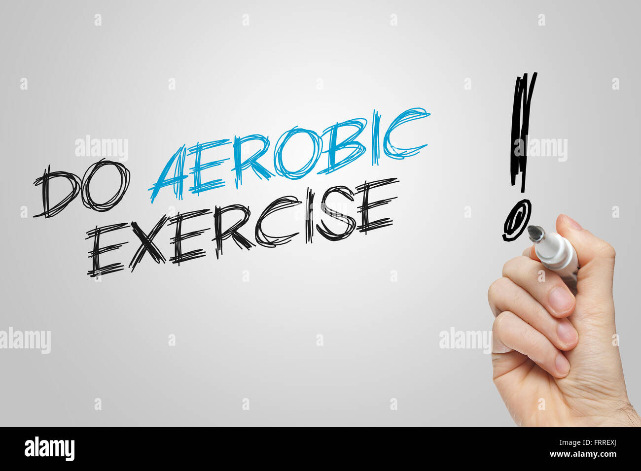 Hand writing do aerobic exercise on grey background Stock Photo - Alamy