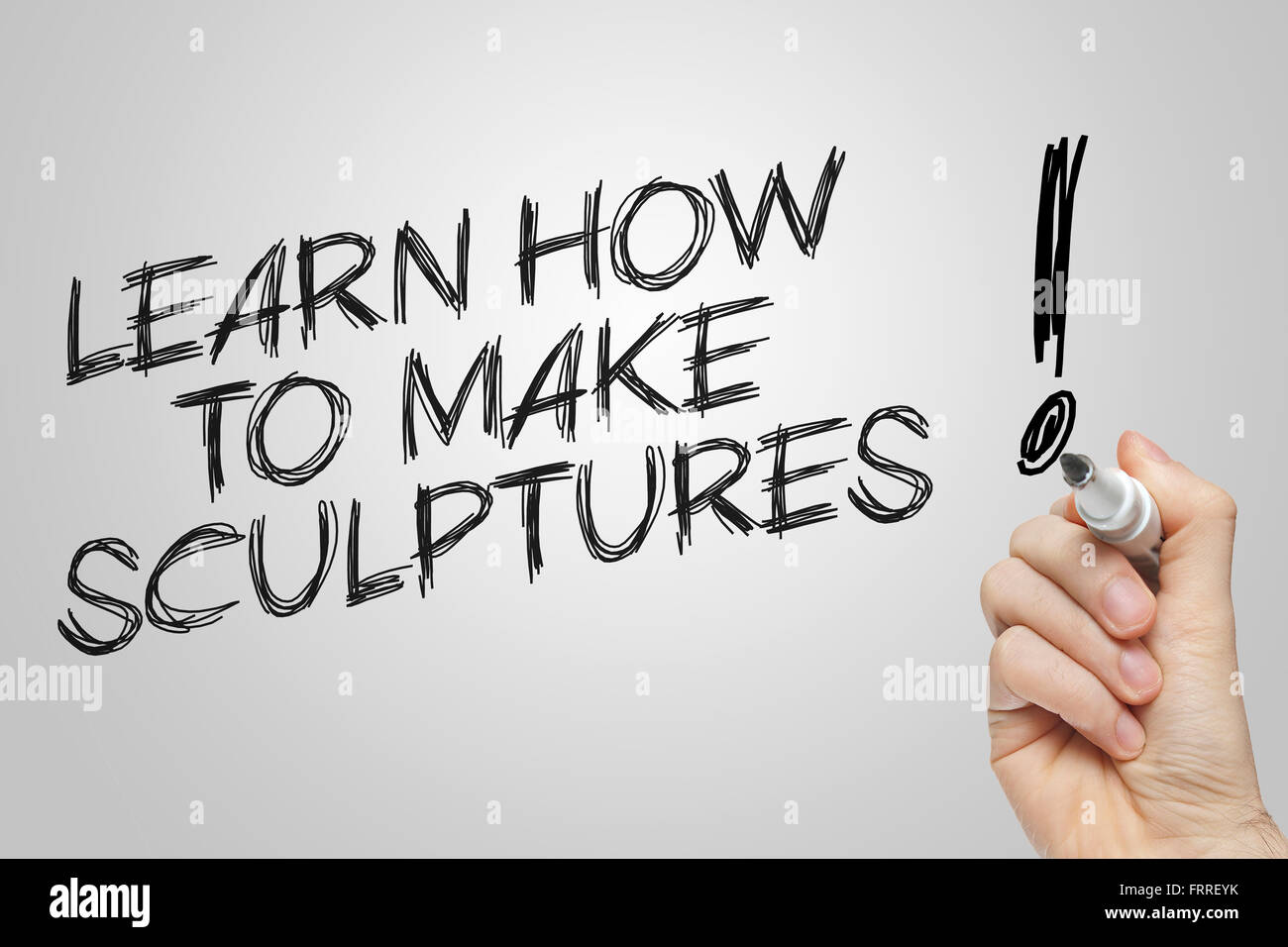 Hand writing learn how to make sculptures on grey background Stock ...