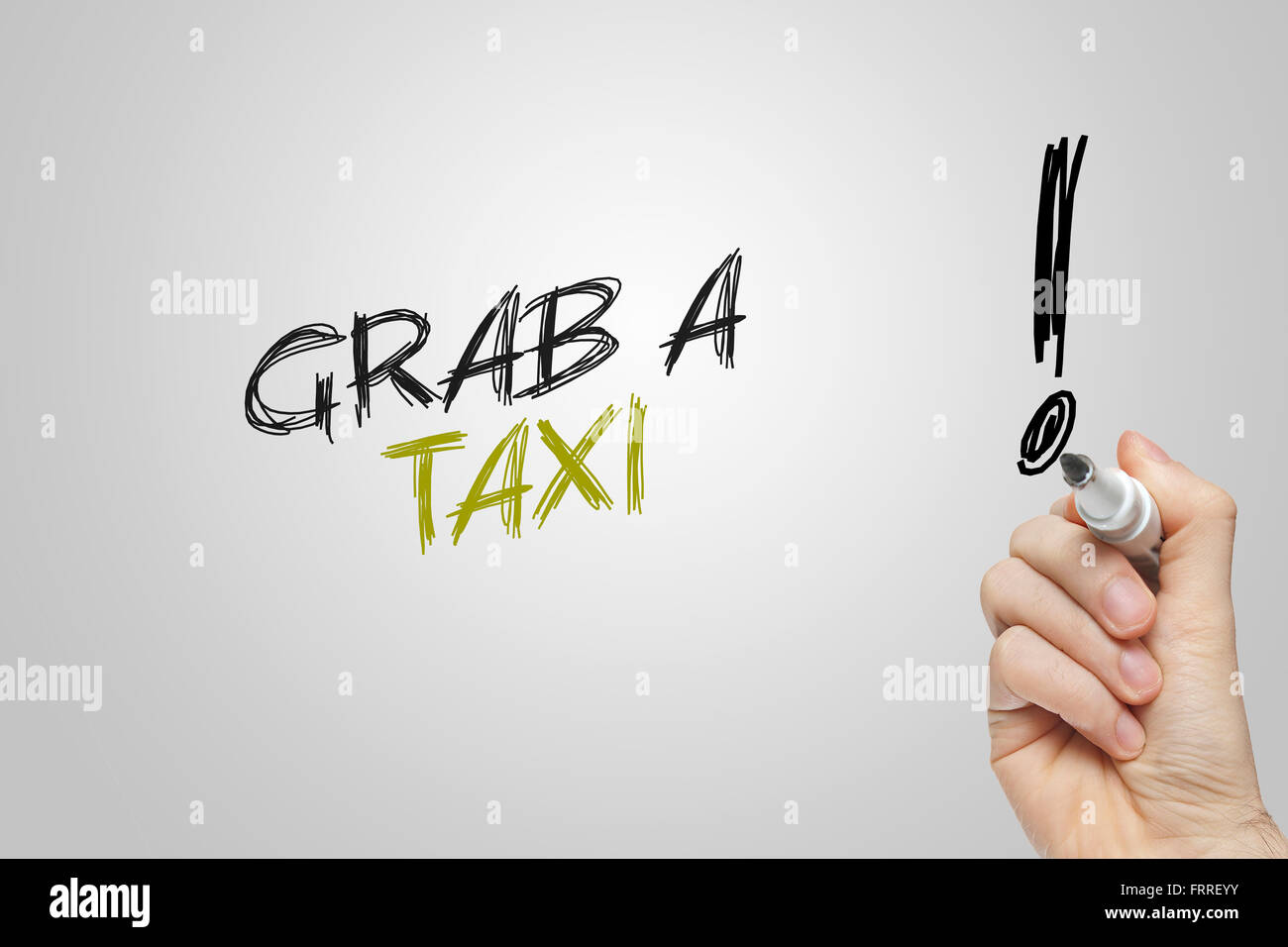 Hand writing grab a taxi on grey background Stock Photo - Alamy