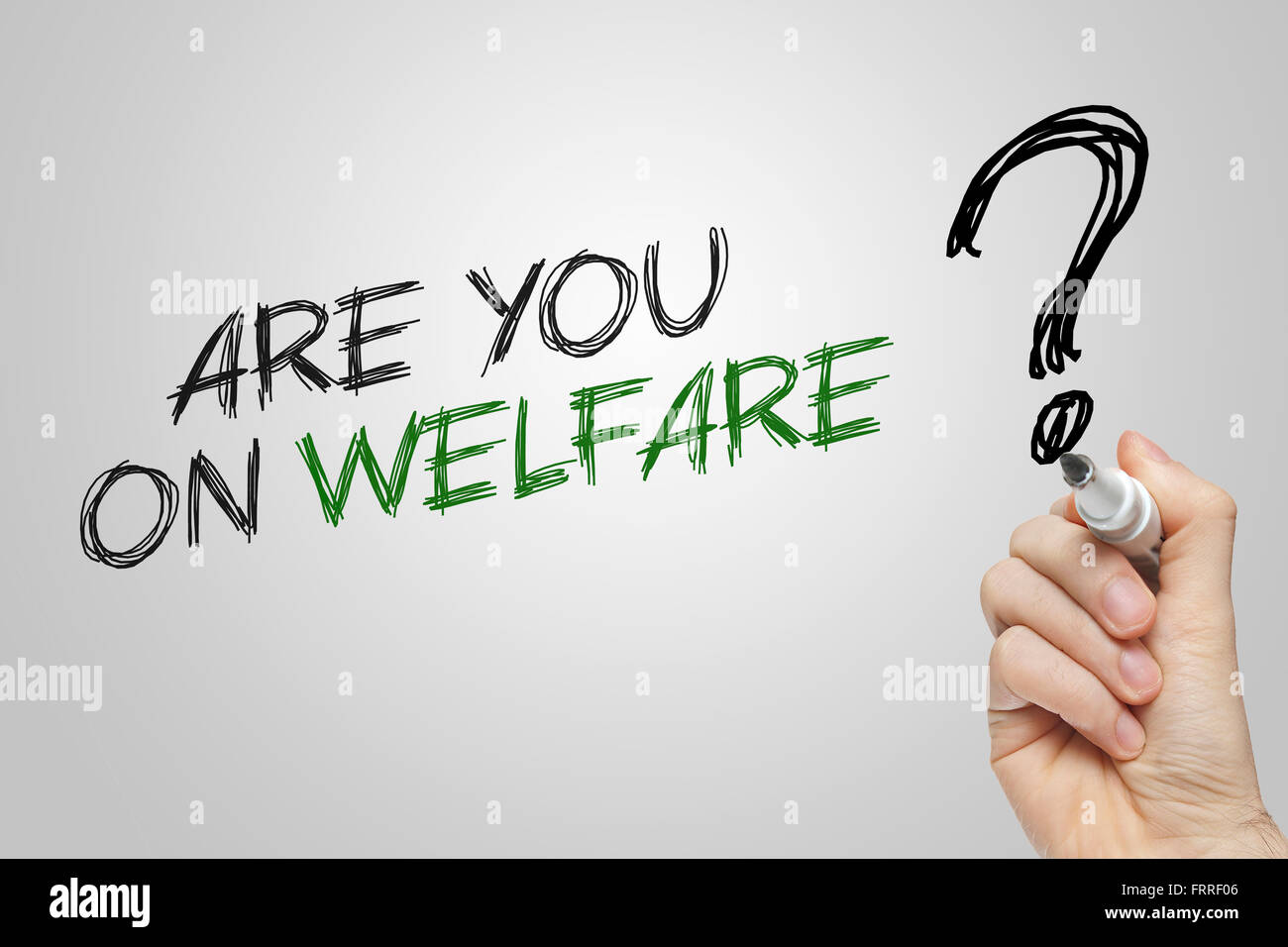 Hand writing are you on welfare on grey background Stock Photo - Alamy