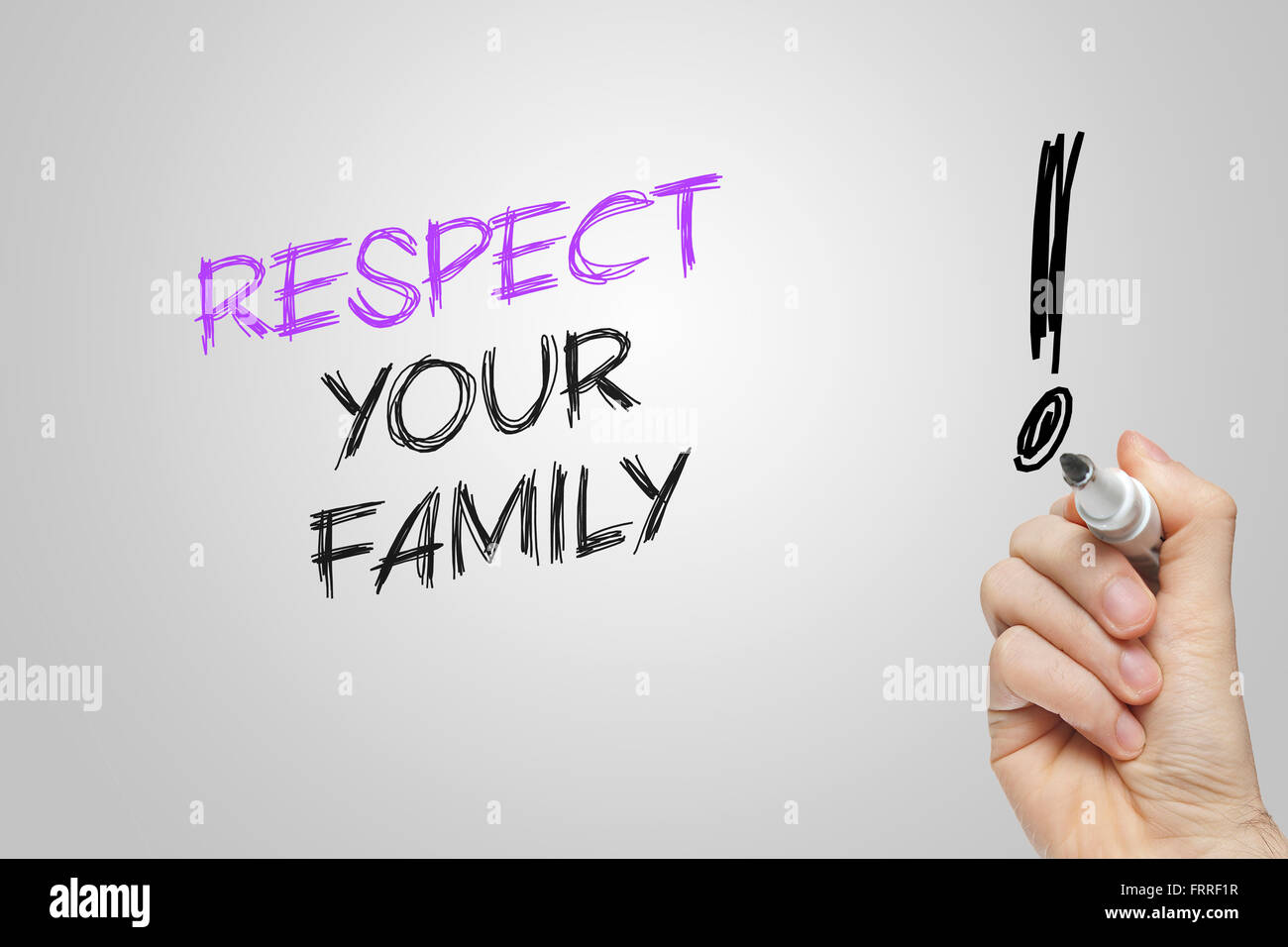 Hand writing respect your family on grey background Stock Photo - Alamy