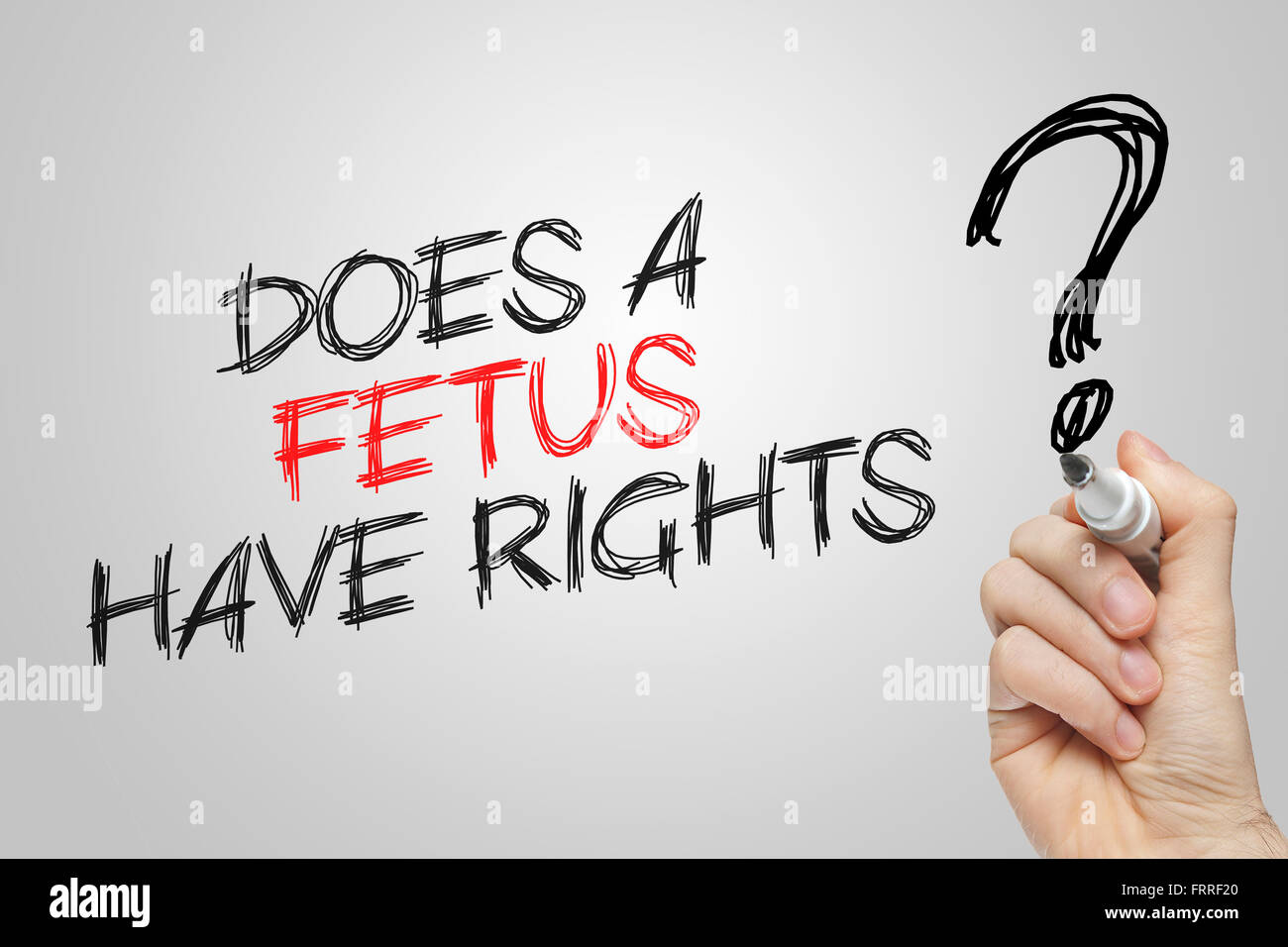 Hand writing does a fetus have rights on grey background Stock Photo ...