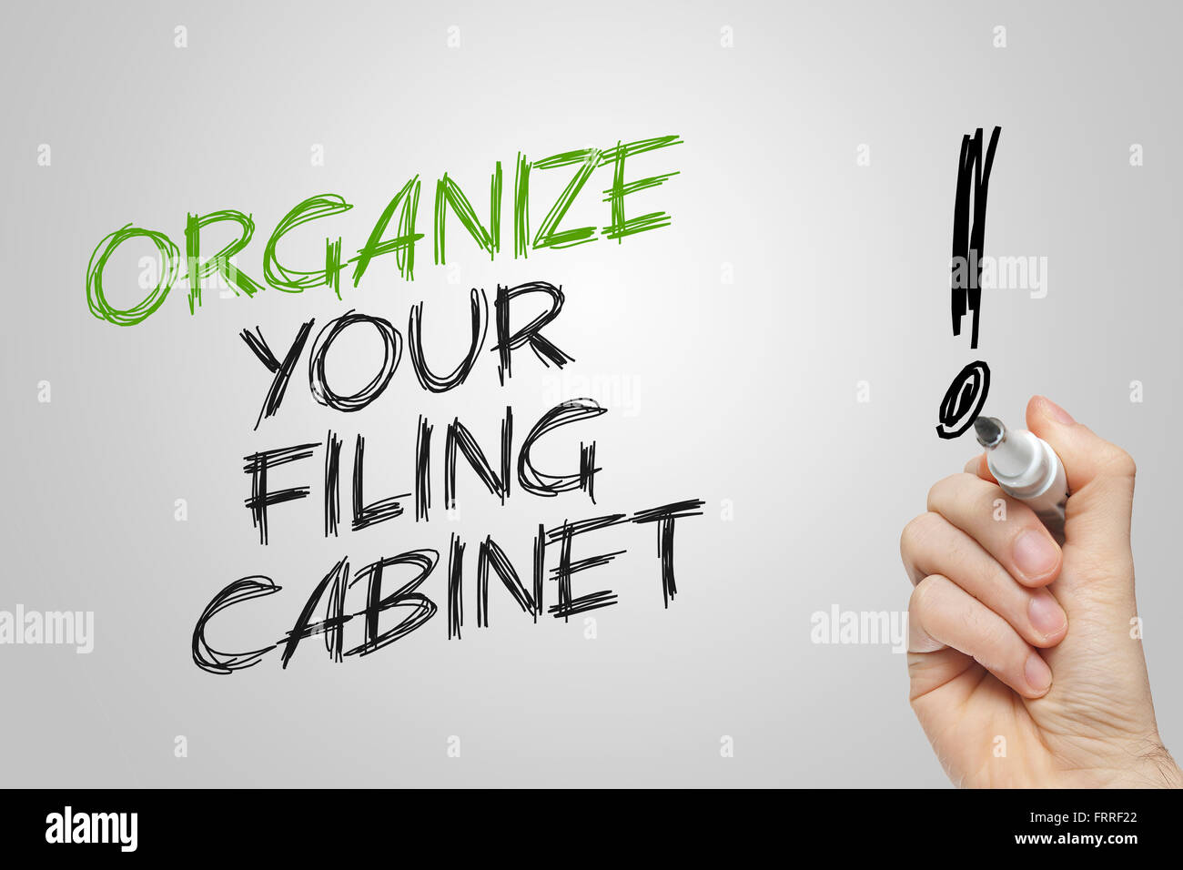 Hand writing organize your filing cabinet on grey background Stock ...