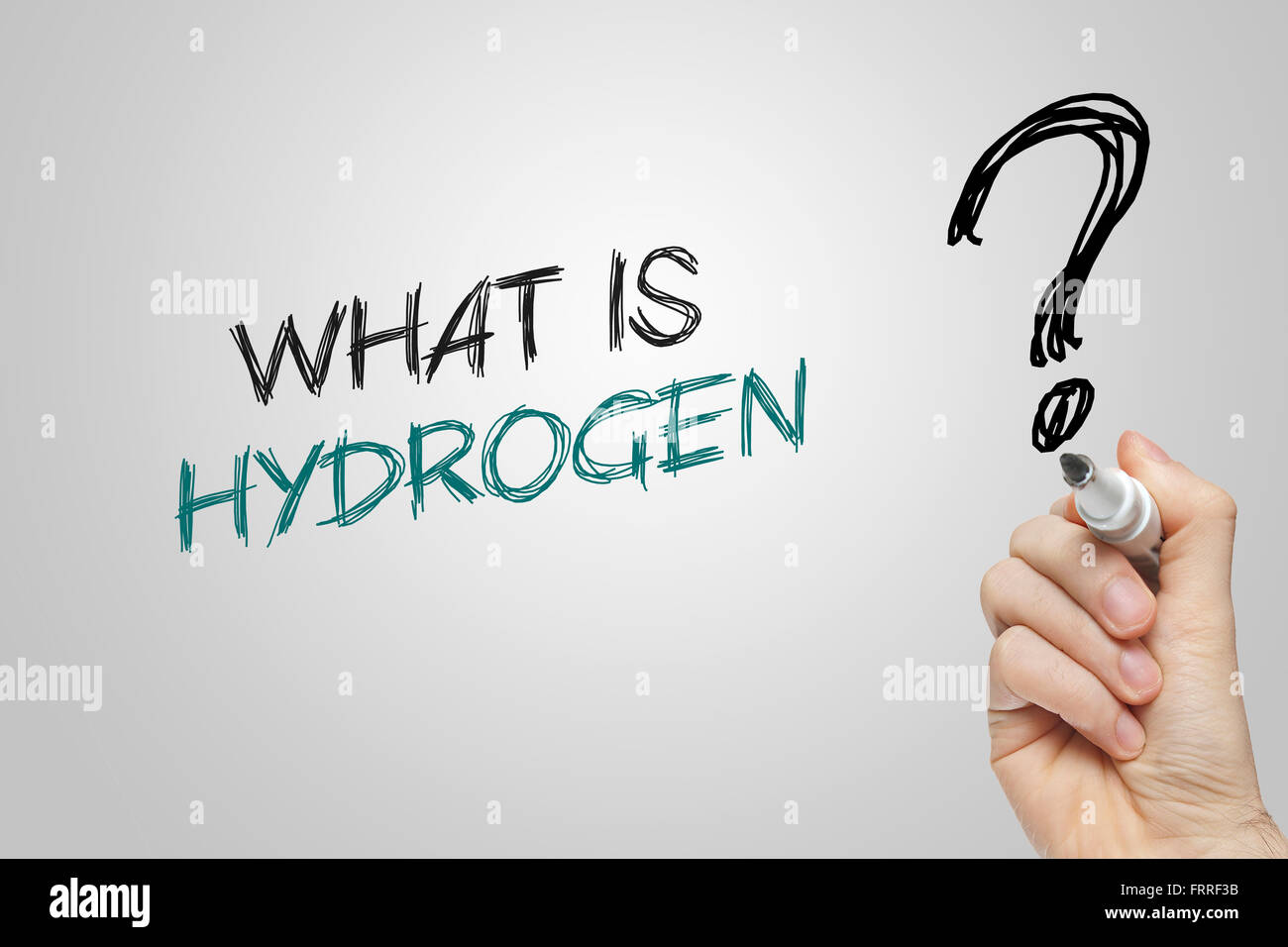 Hand writing what is hydrogen on grey background Stock Photo - Alamy