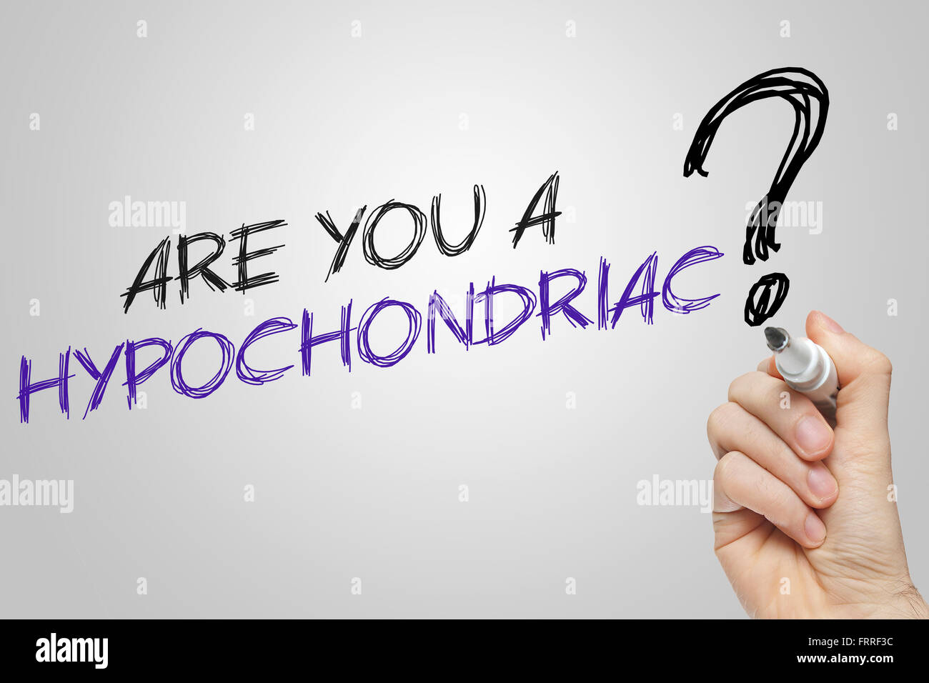 Hand writing are you a hypochondriac on grey background Stock Photo - Alamy