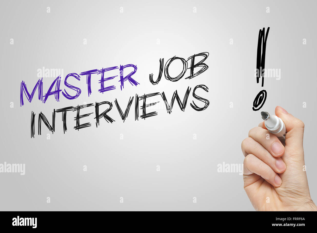 Hand writing master job interviews on grey background Stock Photo - Alamy
