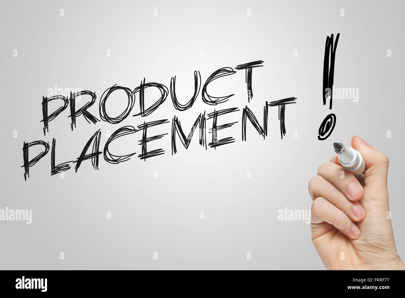 Hand writing product placement on grey background Stock Photo - Alamy