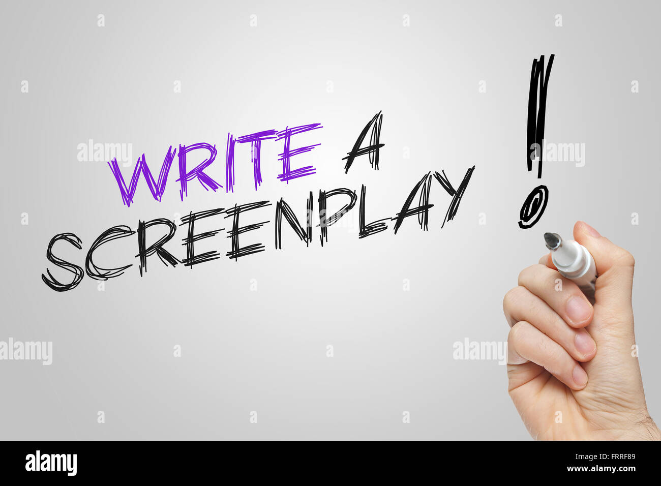 Hand writing write a screenplay on grey background Stock Photo - Alamy