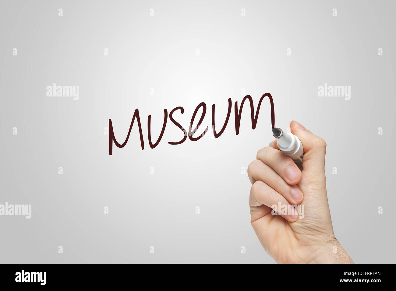 Hand writing museum on grey background Stock Photo - Alamy
