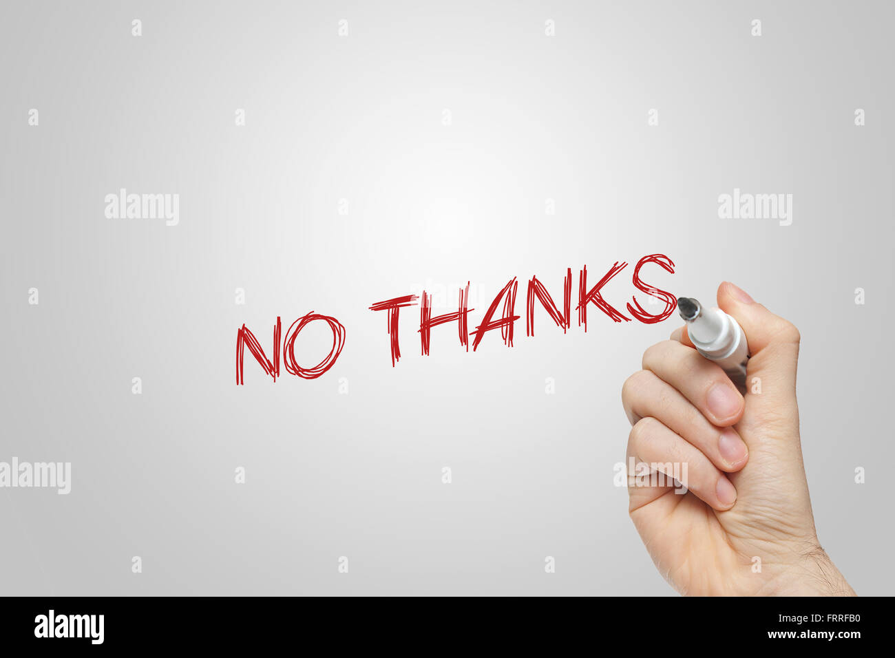 Hand writing no thanks on grey background Stock Photo - Alamy