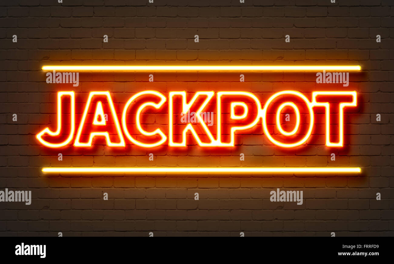 Jackpot neon sign on brick wall background Stock Photo - Alamy