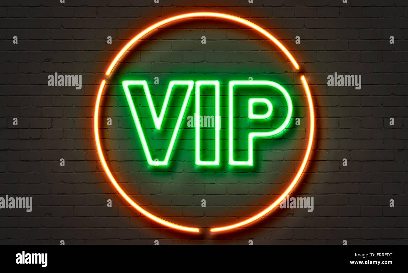 VIP longue neon sign on brick wall background Stock Photo - Alamy