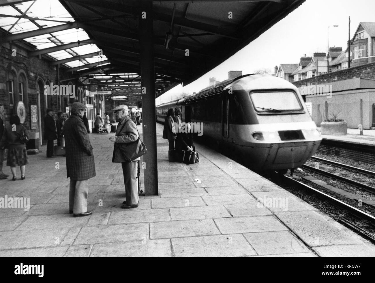 Railway platform train waiting Black and White Stock Photos & Images ...