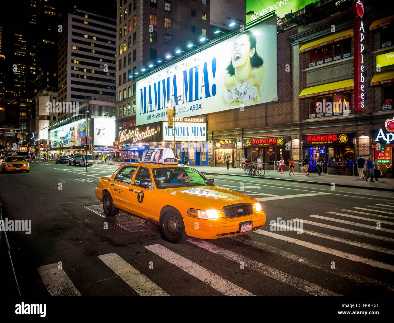Broadway, New York City, USA - Mamma Mia illuminated sign and taxi at ...