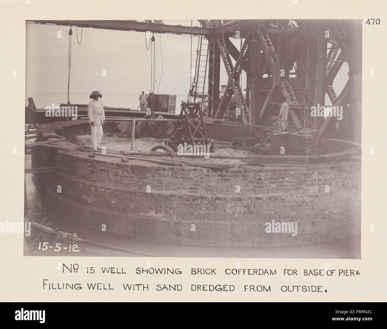 A photograph of the No. 15 well with a brick cofferdam used to support ...