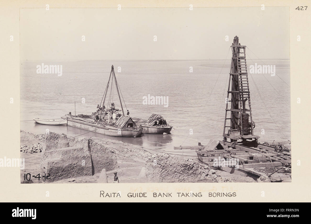 A photograph showing the process of taking borings at a bank for a ...