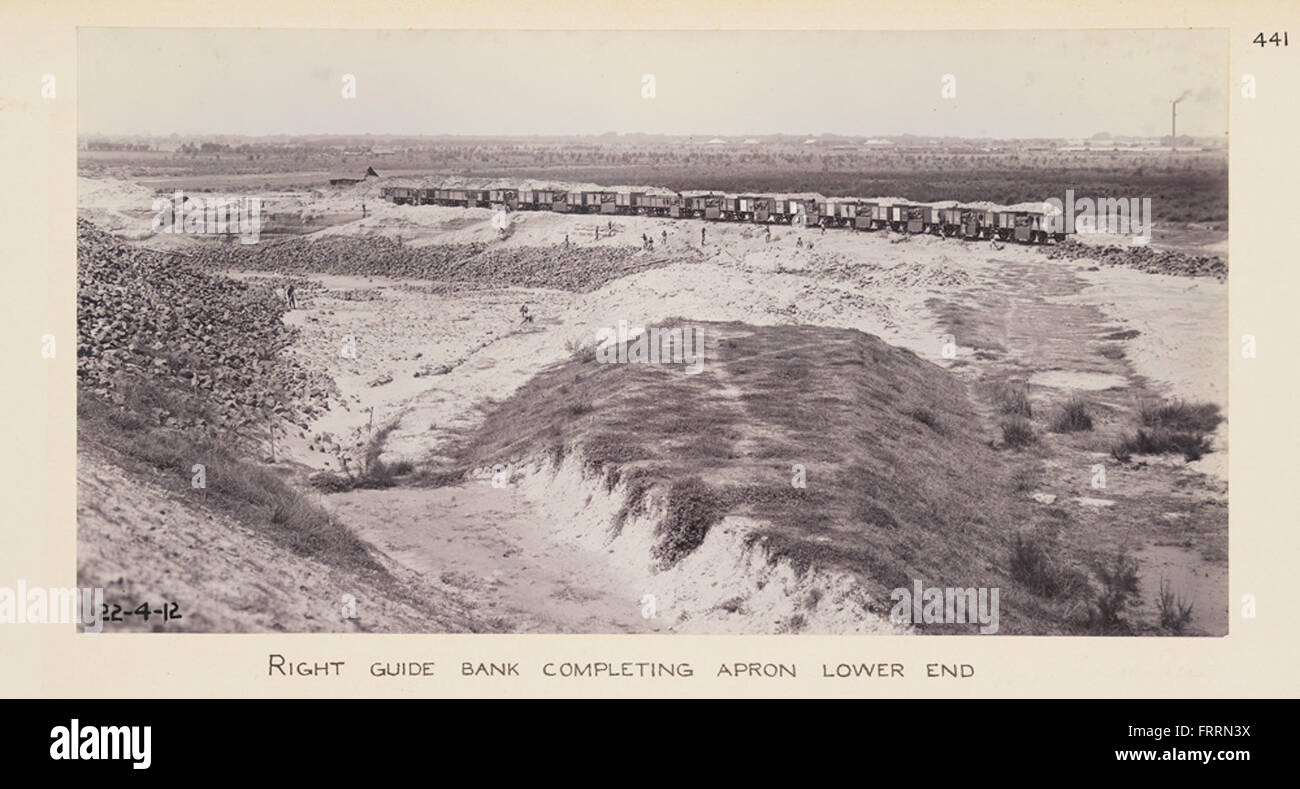 A photograph showing the completion of the right guide bank and apron ...