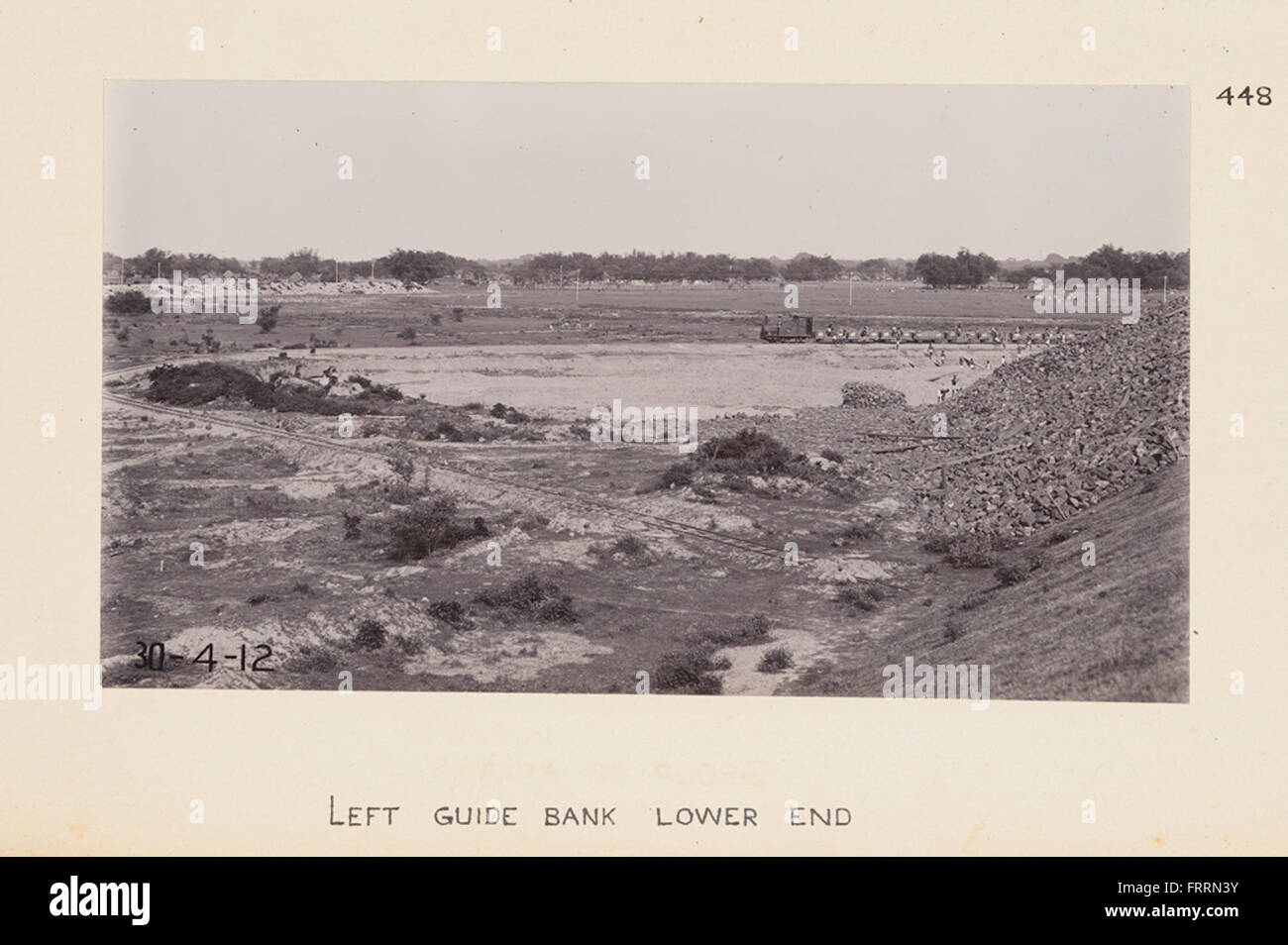The left guide bank at the lower end of a railroad bridge construction ...