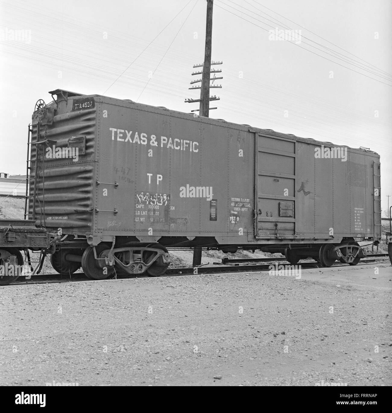 A photograph of the Texas & Pacific Maintenance of Way Box Car No X ...
