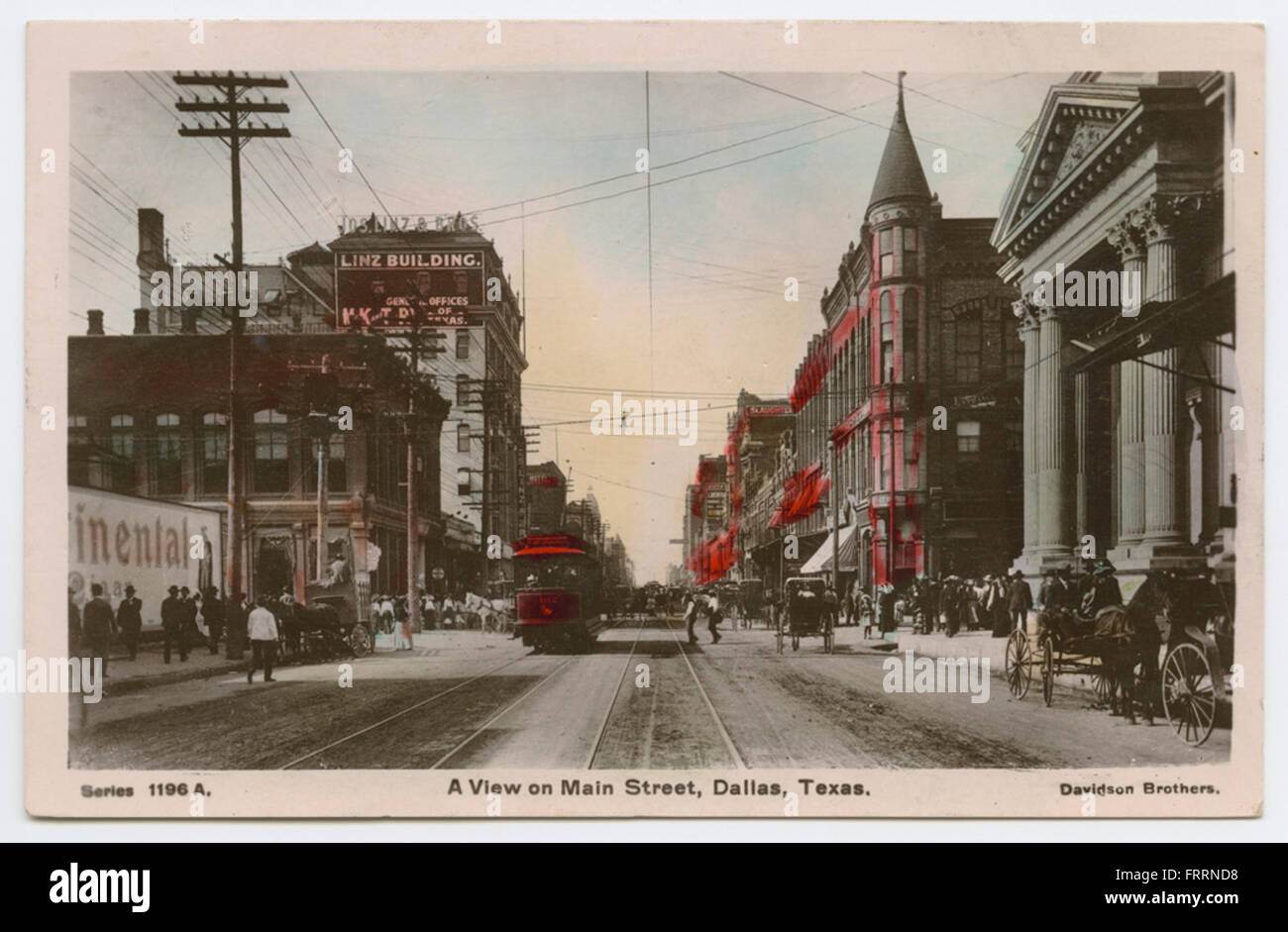 A Real Photo Postcard (RPPC) showing a view of Main Street in Dallas ...