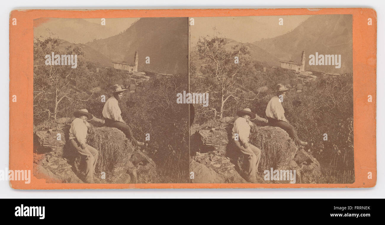 [Two Men Seated on Rock] Stock Photo - Alamy