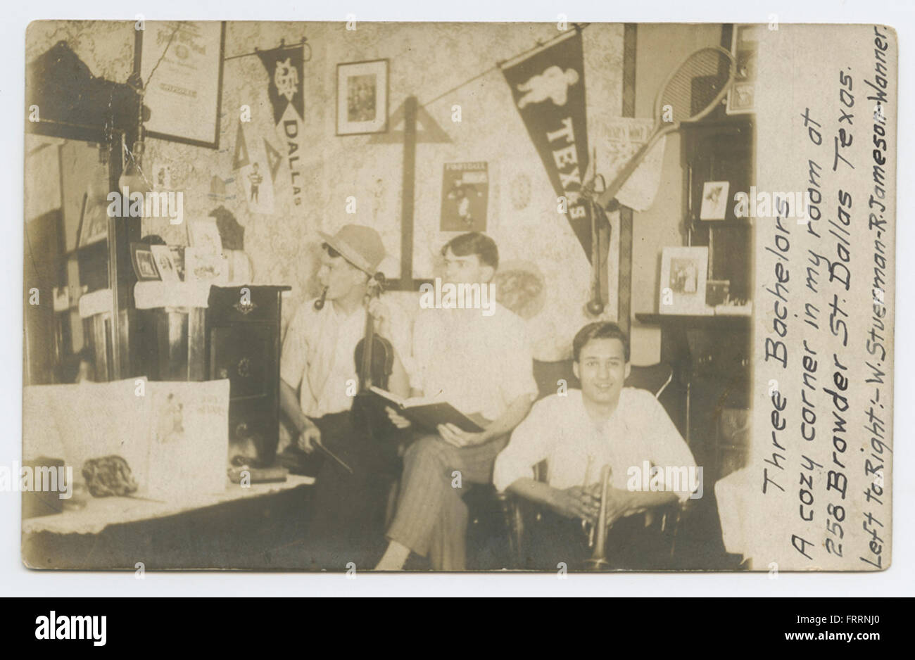 A photograph of three bachelors, likely college students, holding ...