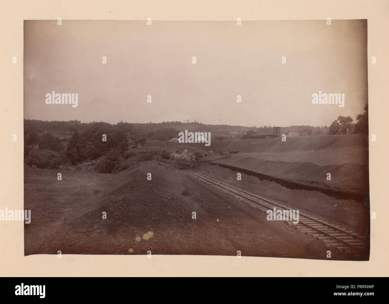 A view of railroad tracks with passing trains, showcasing the railway ...