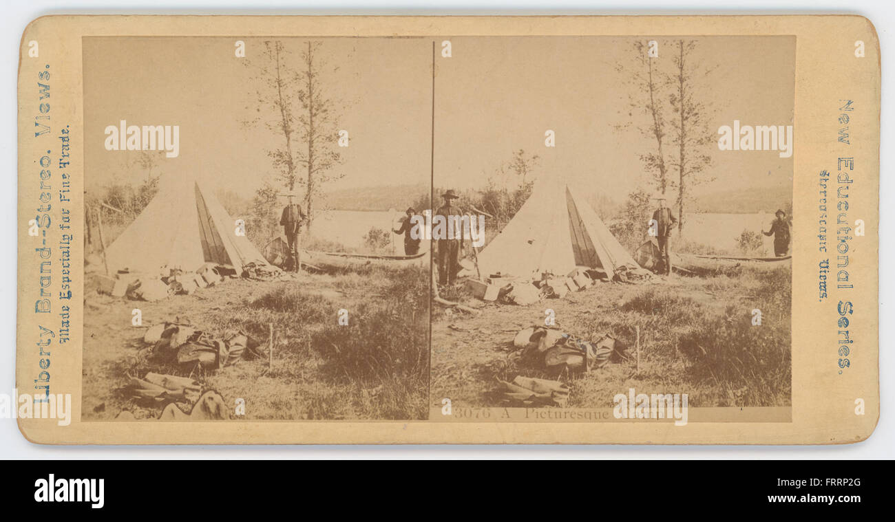 A photograph of a scenic camping site featuring tents set up in a ...