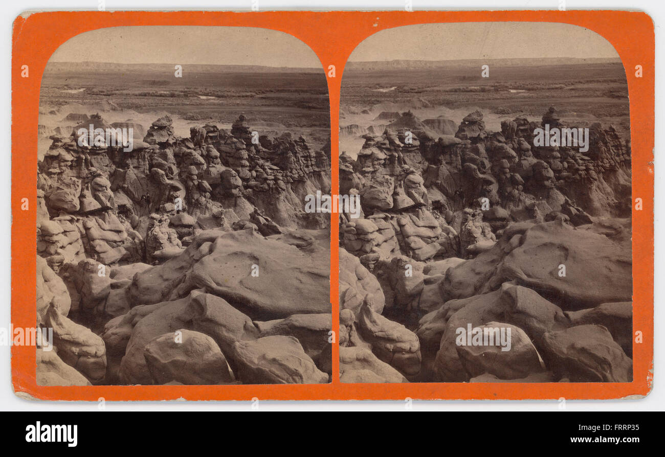 The photograph shows the dramatic badlands landscape near Fort Bridger ...