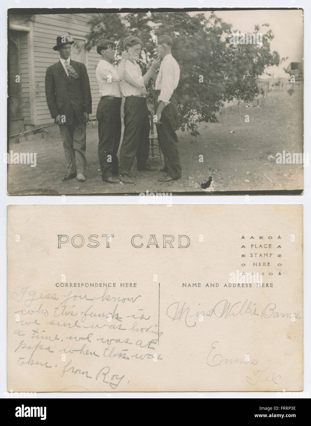 A group of men grooming each other in a social setting, engaging in ...