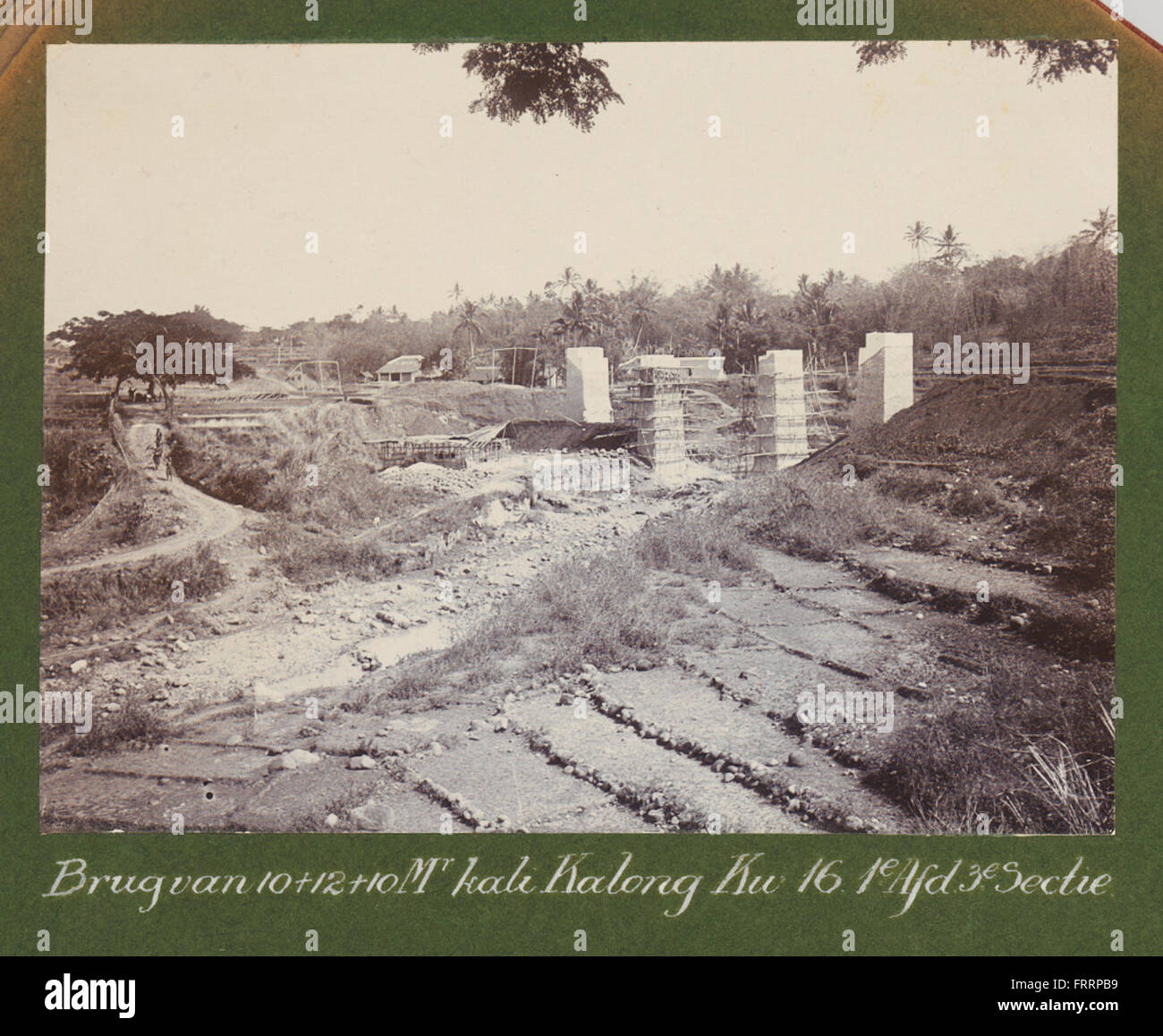 A photograph showing the construction of a bridge over the Kali Kalong ...