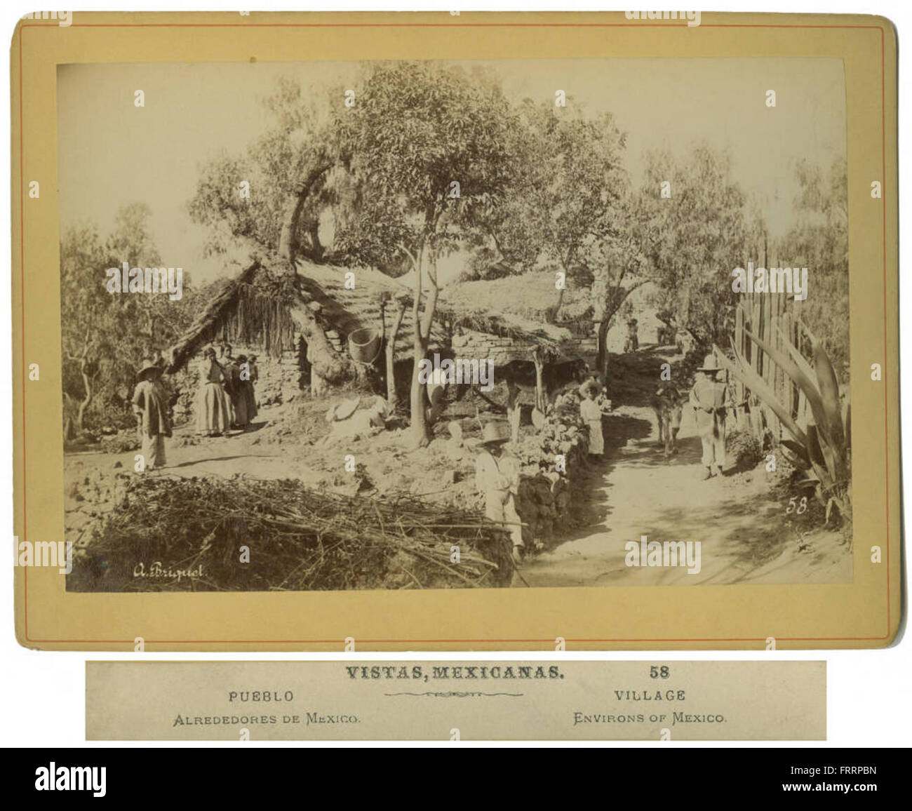 A photograph depicting a traditional Pueblo community, showcasing adobe ...