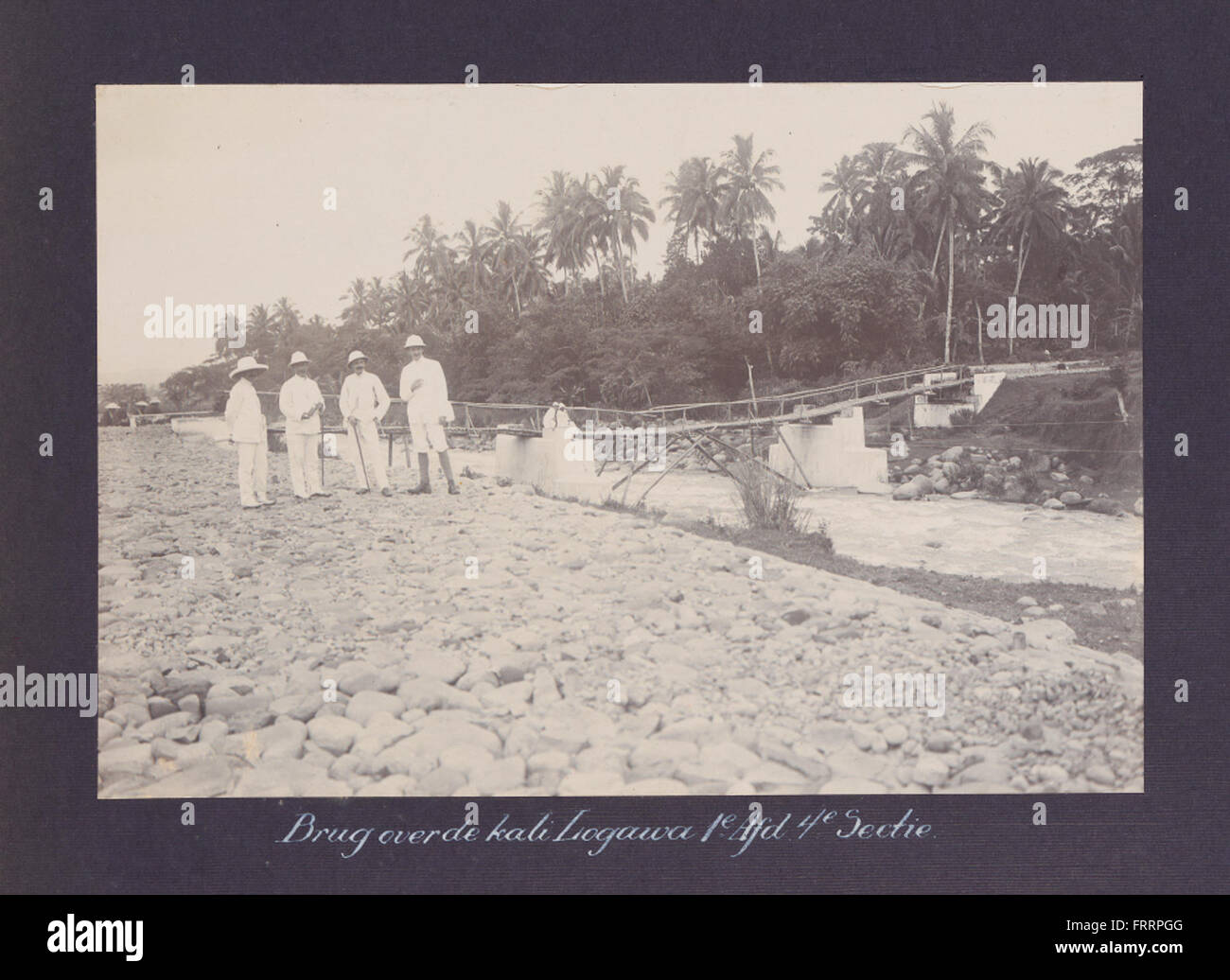 A photograph showing the construction of a bridge over the Kali Logawa ...