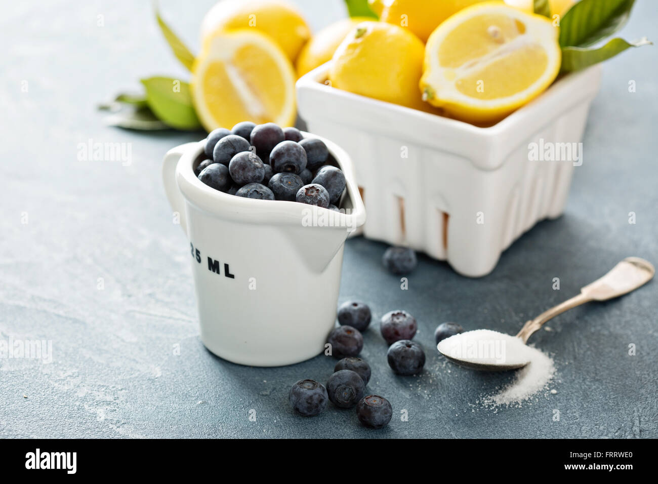 Cooking with lemons and blueberry Stock Photo - Alamy