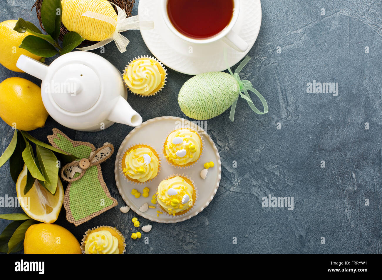 Easter background with lemon cupcakes Stock Photo - Alamy