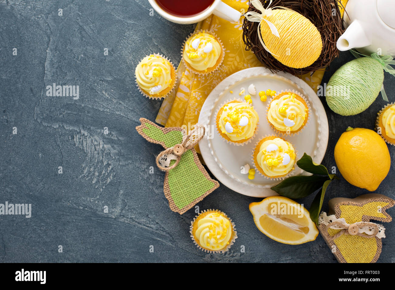 Easter background with lemon cupcakes Stock Photo - Alamy