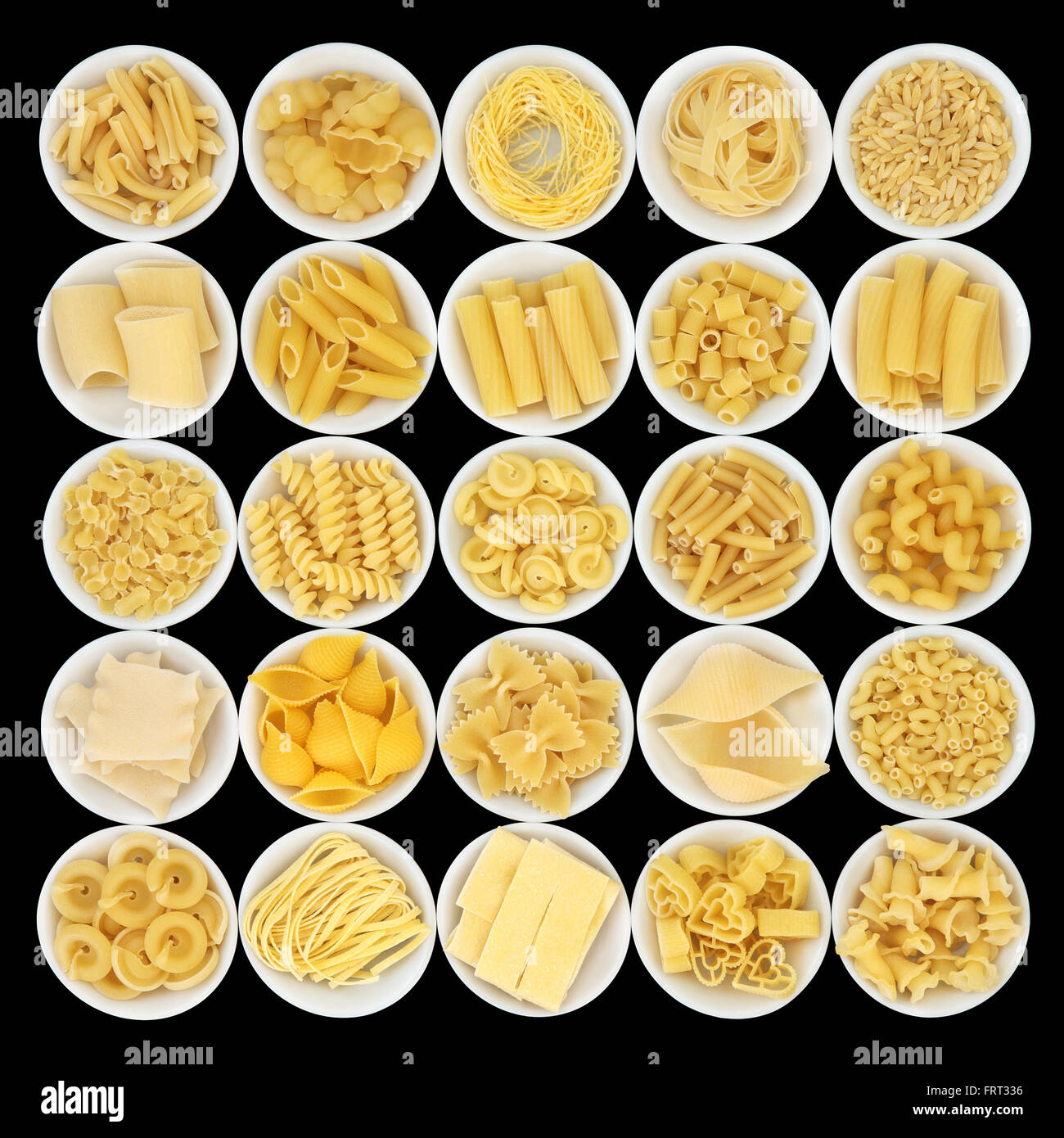 Italian dried food pasta selection over black background Stock Photo ...