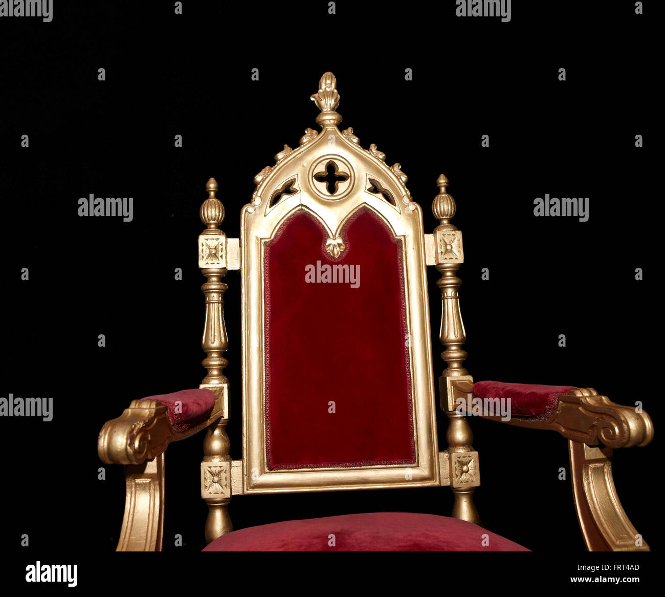 Golden royal chair isolated on black. Horizontal format Stock Photo - Alamy