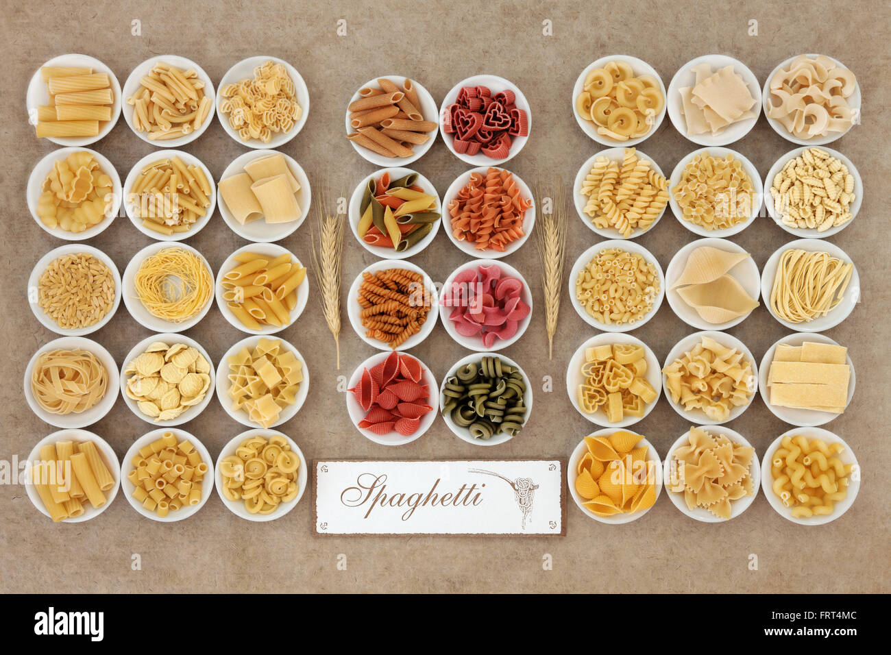 Large spaghetti pasta selection in white china bowls with spaghetti ...