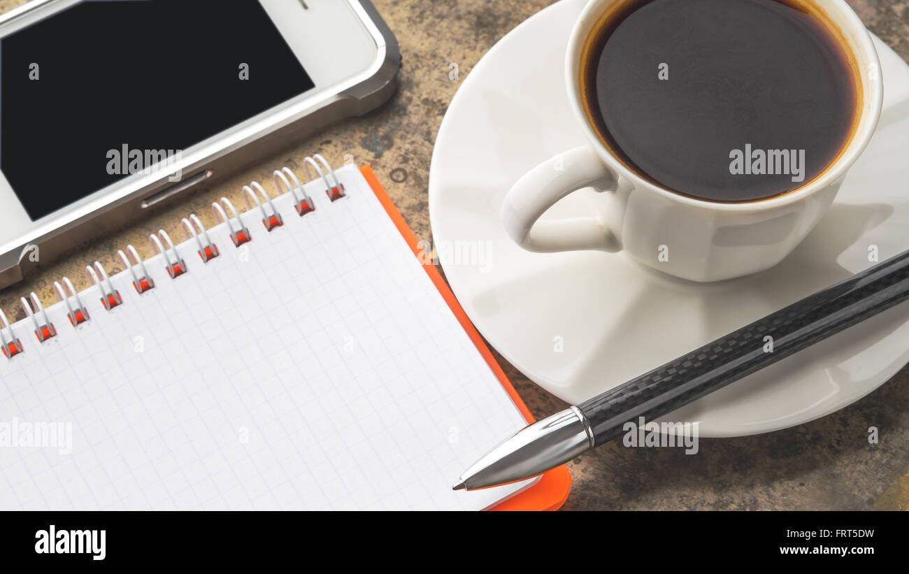 Coffee break set on the stone table Stock Photo - Alamy