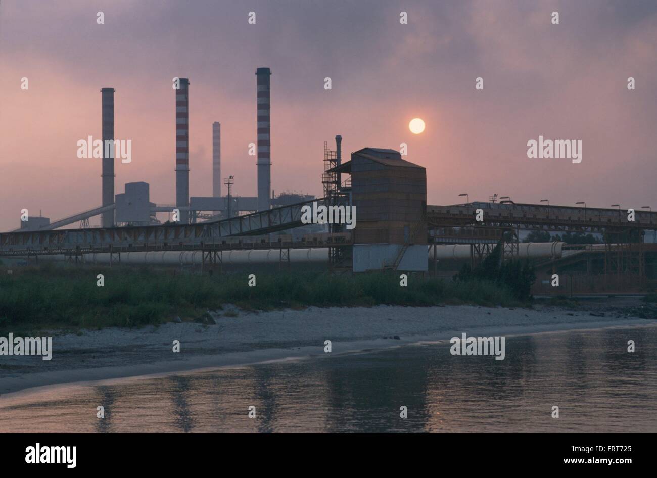 The ALCOA Aluminum plant in Portovesme (Sardinia island, Italy Stock ...