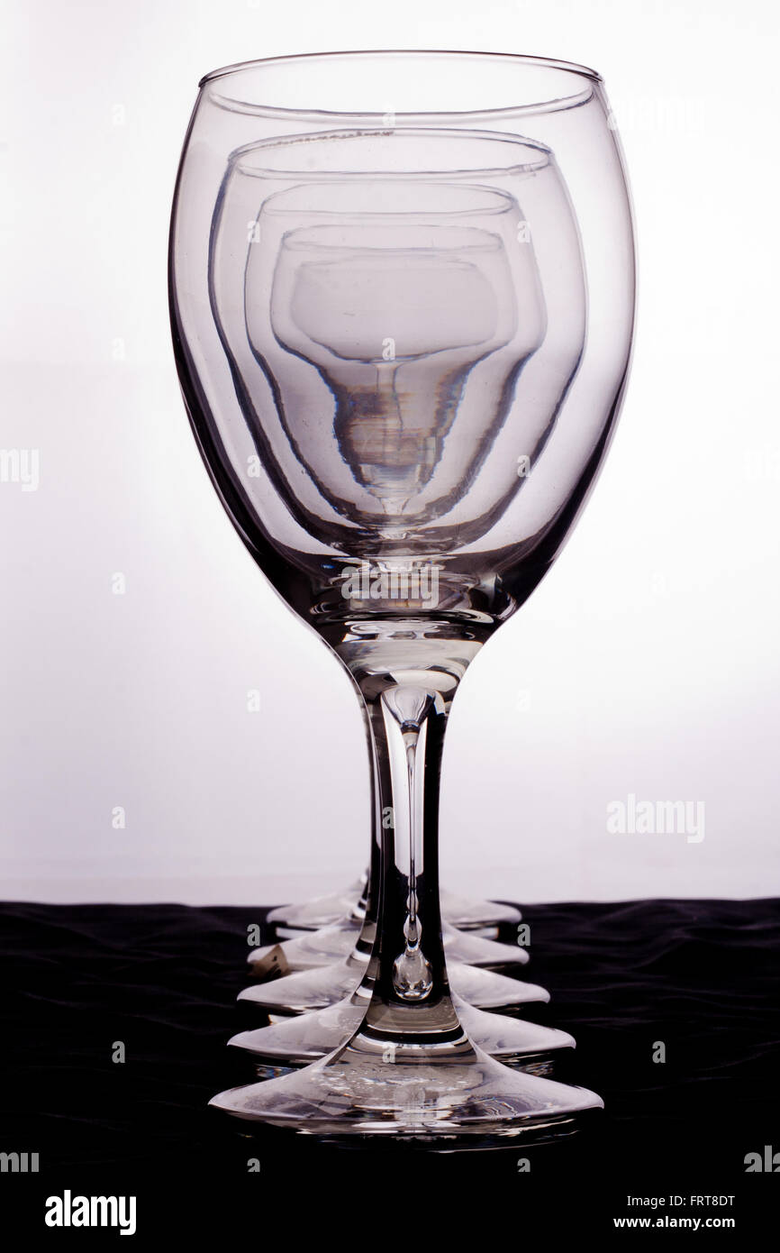 Abstract, five wine glasses Stock Photo - Alamy