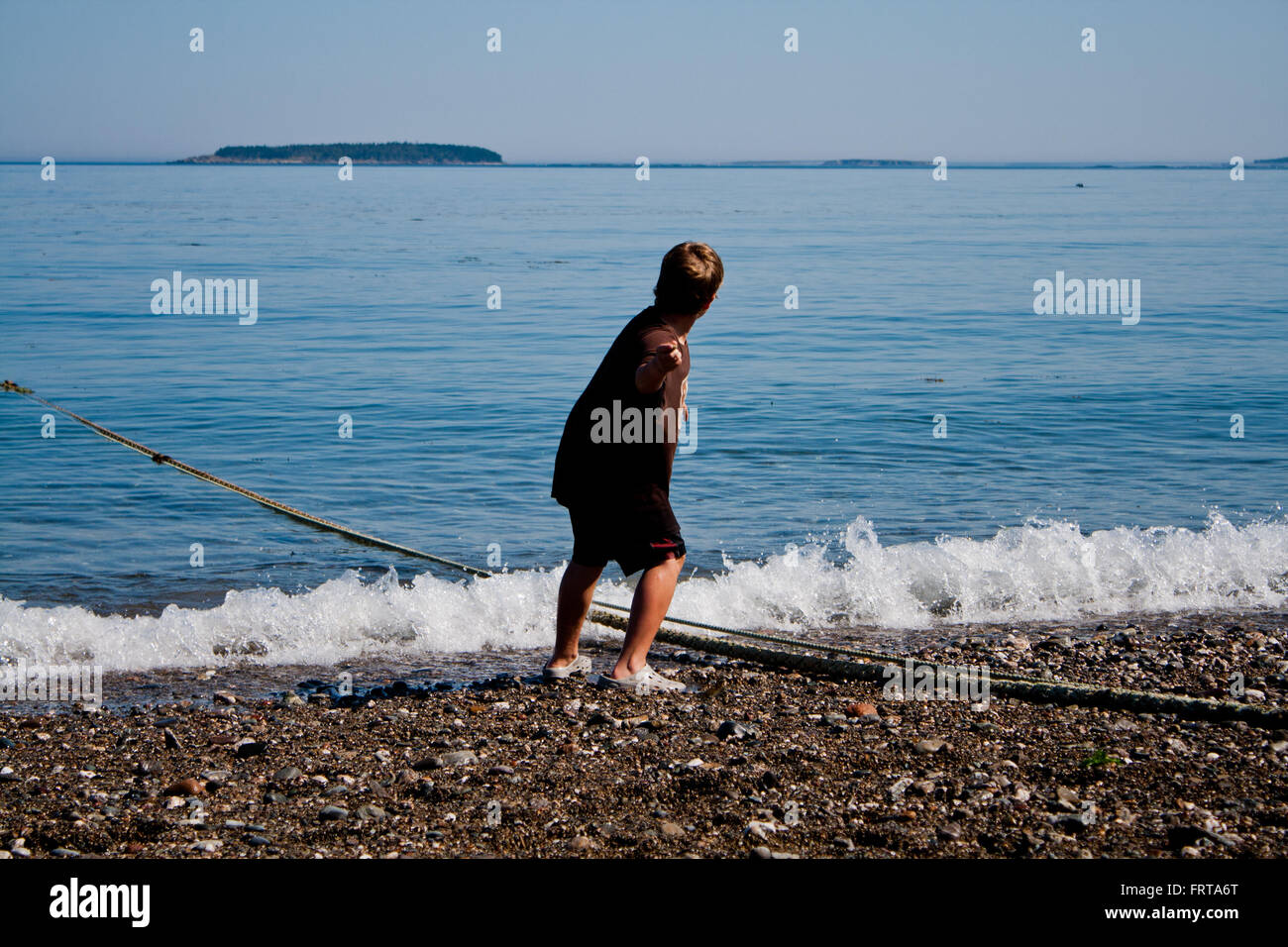 Throwing rocks in water hi-res stock photography and images - Alamy