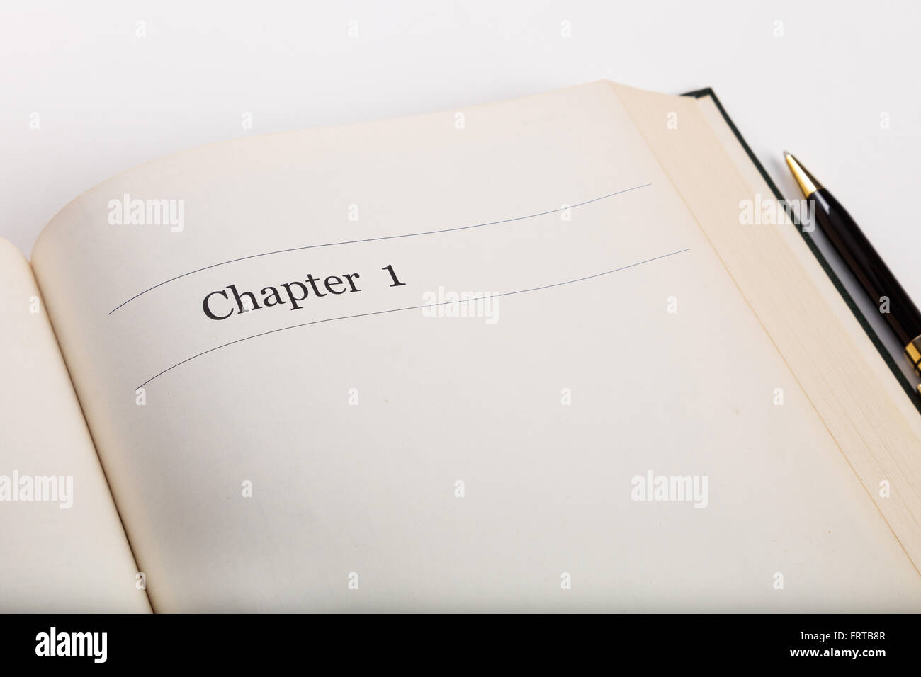 chapter one, in an open book with a pen Stock Photo - Alamy