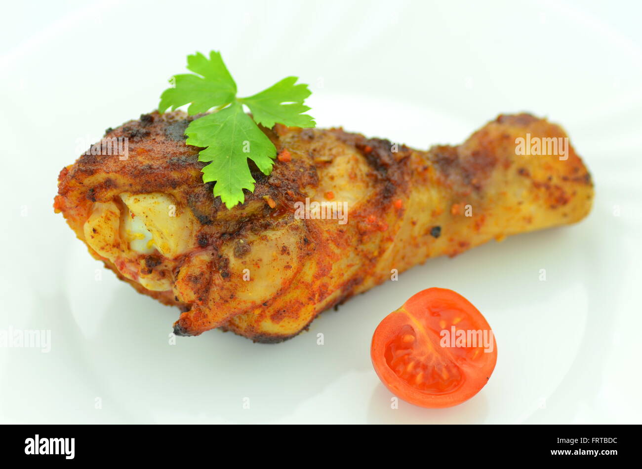 delicious fried chicken leg on white plate Stock Photo - Alamy