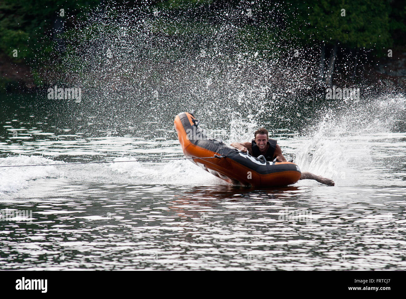 Tow behind boat hi-res stock photography and images - Alamy